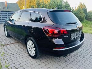 Red Opel Astra 2014 in Marijampole, with an engine capacity of 1.96 L and mileage of 169 thousand km for 4450 €, photo 3 on AUTOMOTO.COM.LV