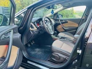 Red Opel Astra 2014 in Marijampole, with an engine capacity of 1.96 L and mileage of 169 thousand km for 4450 €, photo 9 on AUTOMOTO.COM.LV