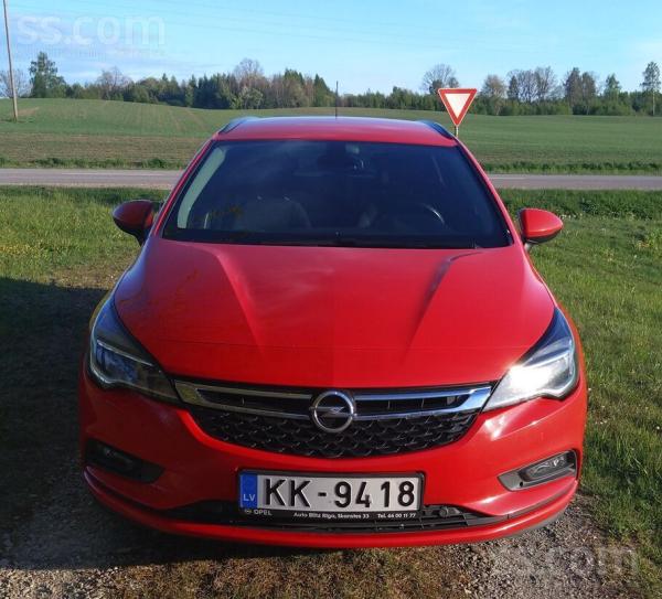 Red Opel Astra 2016 in Liepaja, with an engine capacity of 1.60 L and mileage of 190 thousand km for 5000 €, photo 1 on AUTOMOTO.COM.LV