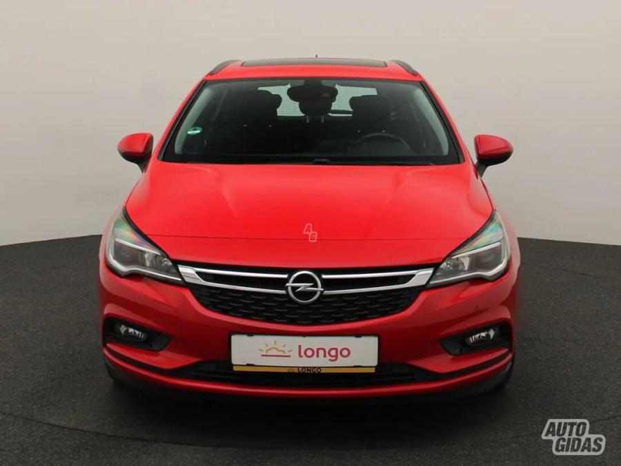 Red Opel Astra 2016 in Vilnius, with an engine capacity of 1.60 L and mileage of 293 thousand km for 5099 €, photo 4 on AUTOMOTO.COM.LV