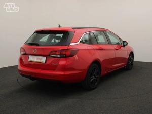 Red Opel Astra 2016 in Vilnius, with an engine capacity of 1.60 L and mileage of 293 thousand km for 5099 €, photo 9 on AUTOMOTO.COM.LV