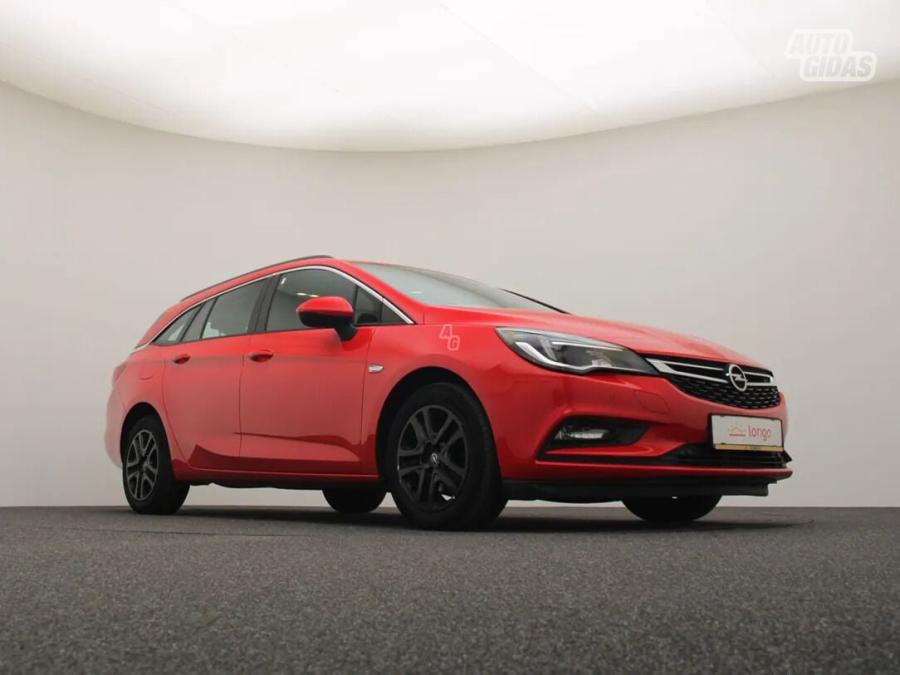 Red Opel Astra 2016 in Vilnius, with an engine capacity of 1.60 L and mileage of 293 thousand km for 5099 €, photo 12 on AUTOMOTO.COM.LV