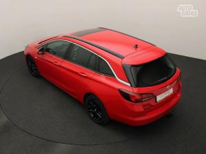 Red Opel Astra 2016 in Vilnius, with an engine capacity of 1.60 L and mileage of 293 thousand km for 5099 €, photo 13 on AUTOMOTO.COM.LV