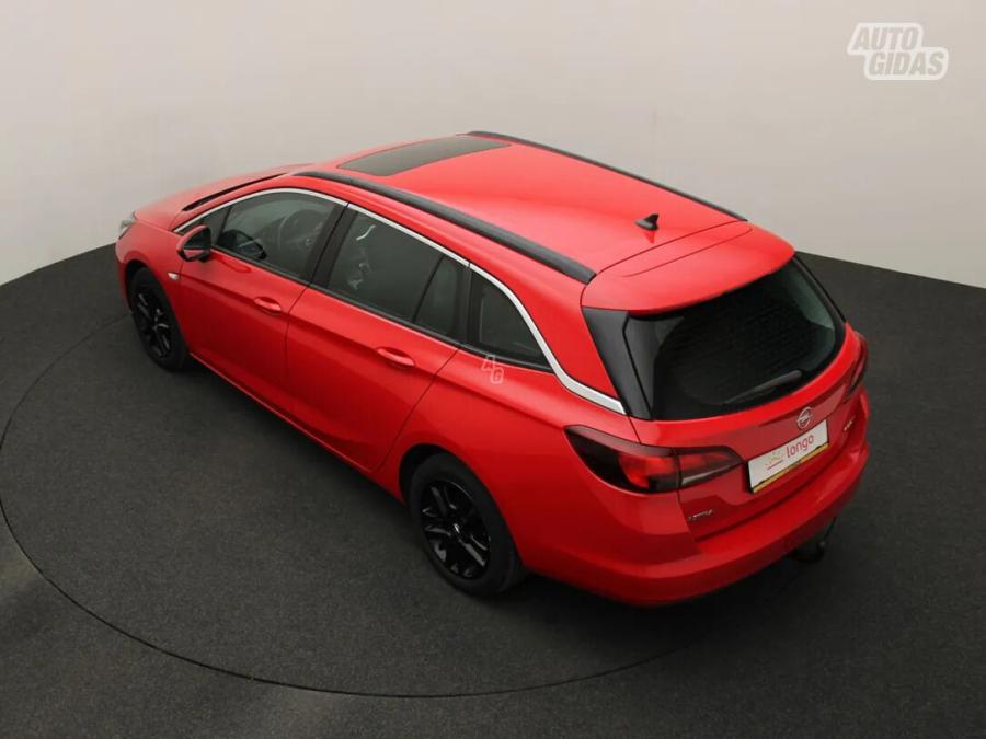 Red Opel Astra 2016 in Vilnius, with an engine capacity of 1.60 L and mileage of 293 thousand km for 5099 €, photo 13 on AUTOMOTO.COM.LV
