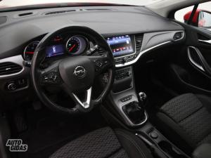 Red Opel Astra 2016 in Vilnius, with an engine capacity of 1.60 L and mileage of 293 thousand km for 5099 €, photo 17 on AUTOMOTO.COM.LV