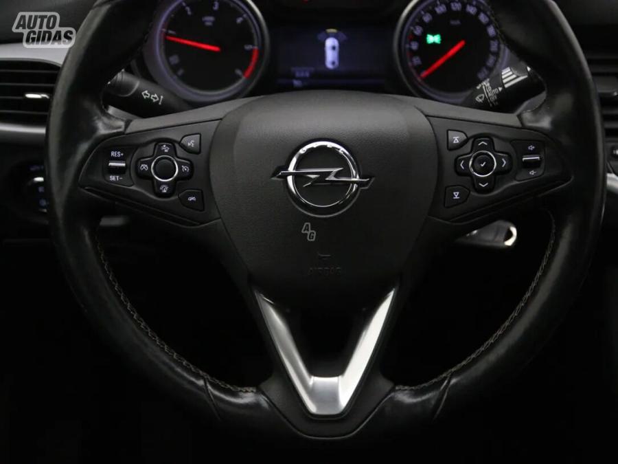 Red Opel Astra 2016 in Vilnius, with an engine capacity of 1.60 L and mileage of 293 thousand km for 5099 €, photo 19 on AUTOMOTO.COM.LV