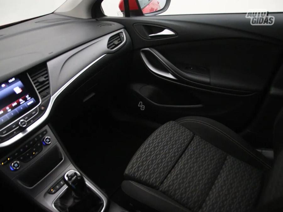 Red Opel Astra 2016 in Vilnius, with an engine capacity of 1.60 L and mileage of 293 thousand km for 5099 €, photo 22 on AUTOMOTO.COM.LV