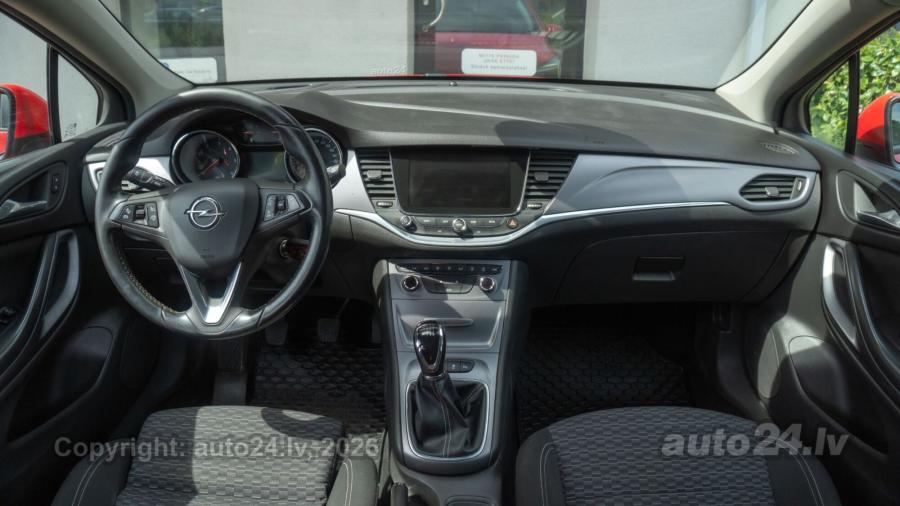 Red Opel Astra 2016 in Tallinn, with an engine capacity of 1.60 L and mileage of 234 thousand km for 6790 €, photo 14 on AUTOMOTO.COM.LV