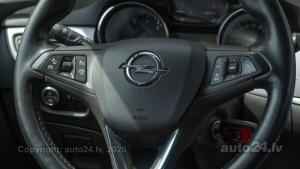 Red Opel Astra 2016 in Tallinn, with an engine capacity of 1.60 L and mileage of 234 thousand km for 6790 €, photo 16 on AUTOMOTO.COM.LV