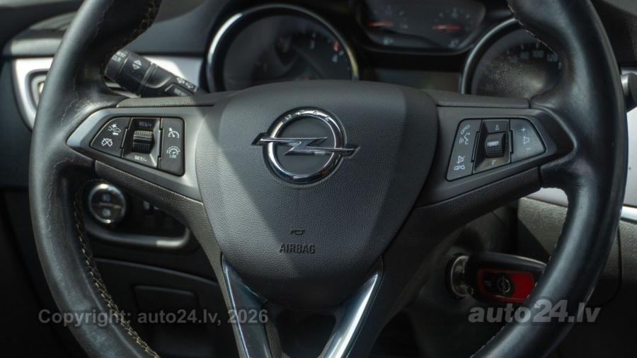 Red Opel Astra 2016 in Tallinn, with an engine capacity of 1.60 L and mileage of 234 thousand km for 6790 €, photo 16 on AUTOMOTO.COM.LV