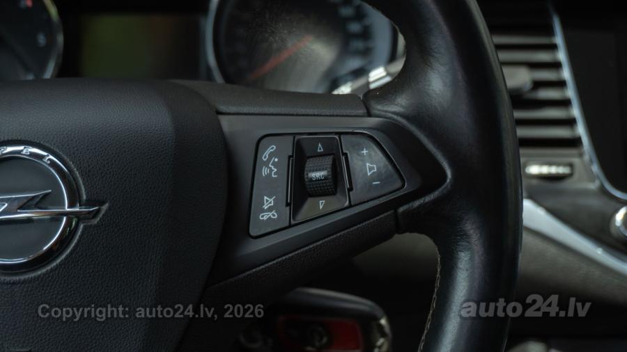 Red Opel Astra 2016 in Tallinn, with an engine capacity of 1.60 L and mileage of 234 thousand km for 6790 €, photo 18 on AUTOMOTO.COM.LV