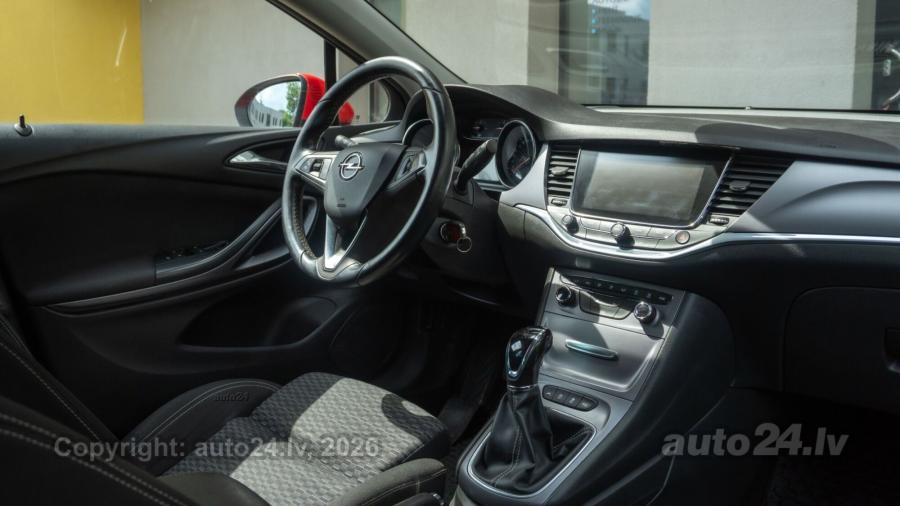 Red Opel Astra 2016 in Tallinn, with an engine capacity of 1.60 L and mileage of 234 thousand km for 6790 €, photo 19 on AUTOMOTO.COM.LV