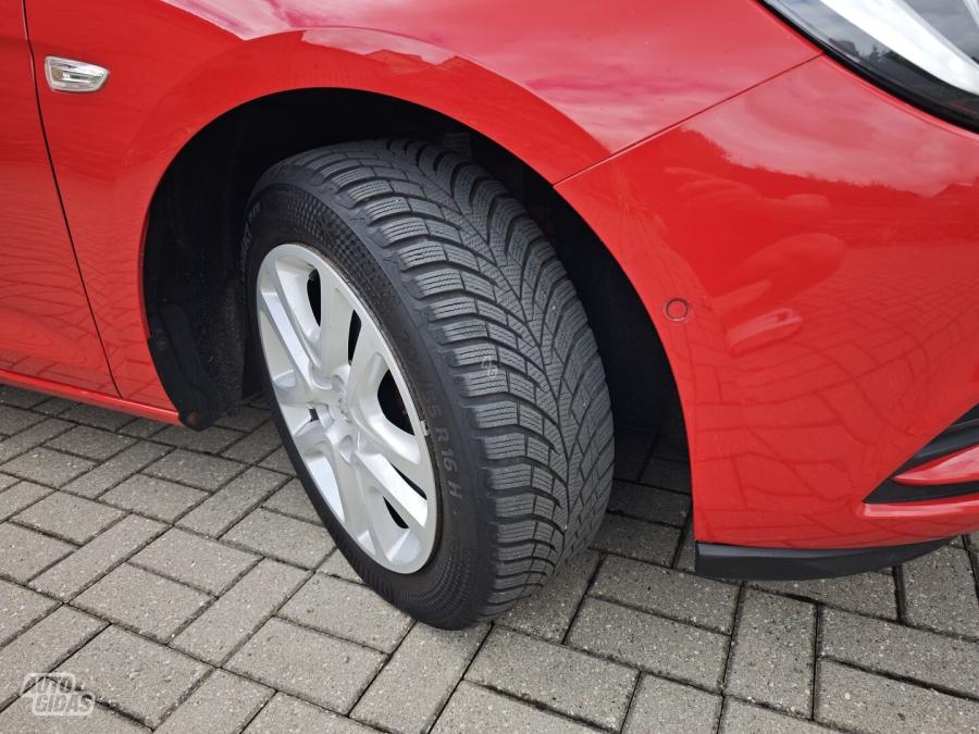 Red Opel Astra 2017 in Vilnius, with an engine capacity of 1.60 L and mileage of 221 thousand km for 5999 €, photo 35 on AUTOMOTO.COM.LV