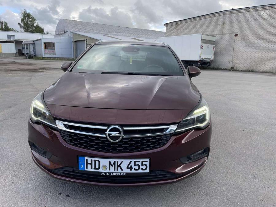 Red Opel Astra 2018 in Telschi, with an engine capacity of 1.60 L and mileage of 198 thousand km for 6499 €, photo 3 on AUTOMOTO.COM.LV