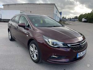 Red Opel Astra 2018 in Telschi, with an engine capacity of 1.60 L and mileage of 198 thousand km for 6499 €, photo 4 on AUTOMOTO.COM.LV