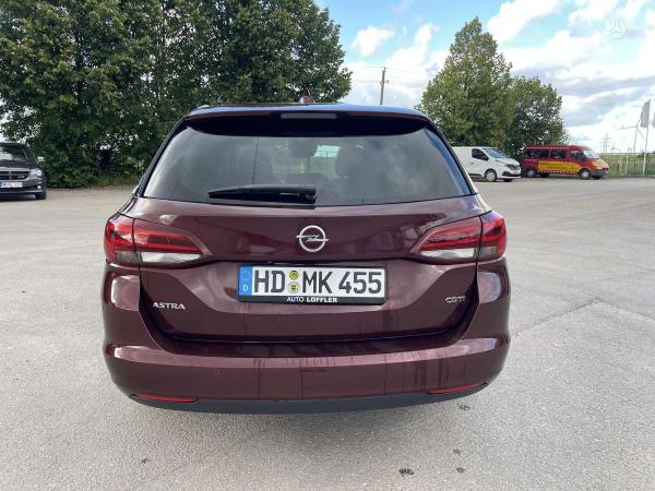 Red Opel Astra 2018 in Telschi, with an engine capacity of 1.60 L and mileage of 198 thousand km for 6499 €, photo 6 on AUTOMOTO.COM.LV