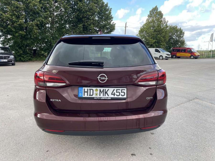 Red Opel Astra 2018 in Telschi, with an engine capacity of 1.60 L and mileage of 198 thousand km for 6499 €, photo 7 on AUTOMOTO.COM.LV