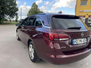 Red Opel Astra 2018 in Telschi, with an engine capacity of 1.60 L and mileage of 198 thousand km for 6499 €, photo 8 on AUTOMOTO.COM.LV