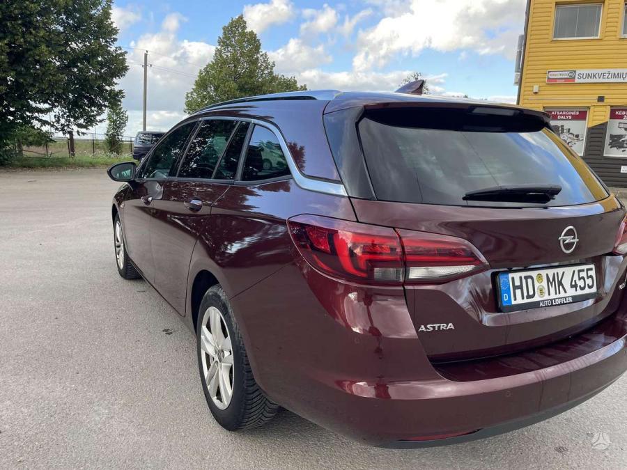 Red Opel Astra 2018 in Telschi, with an engine capacity of 1.60 L and mileage of 198 thousand km for 6499 €, photo 8 on AUTOMOTO.COM.LV