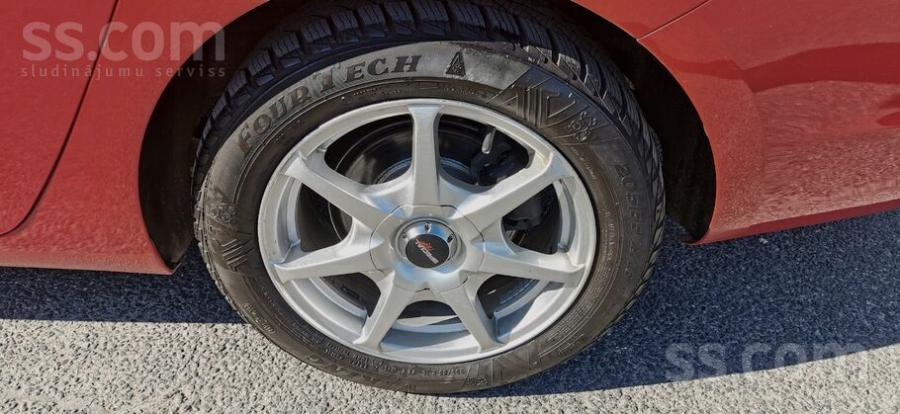 Red Opel Astra 2019 in Riga, with an engine capacity of 1.60 L and mileage of 231 thousand km for 5450 €, photo 11 on AUTOMOTO.COM.LV