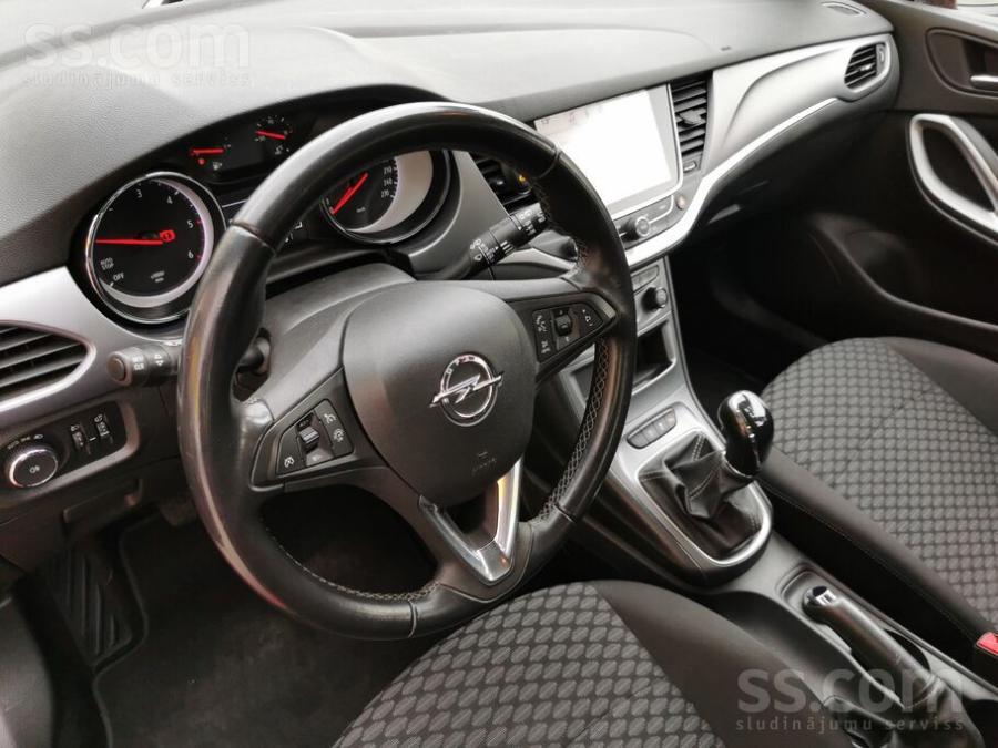 Red Opel Astra 2019 in Riga, with an engine capacity of 1.60 L and mileage of 231 thousand km for 5450 €, photo 18 on AUTOMOTO.COM.LV