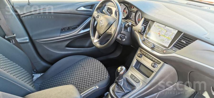 Red Opel Astra 2019 in Riga, with an engine capacity of 1.60 L and mileage of 231 thousand km for 5450 €, photo 27 on AUTOMOTO.COM.LV