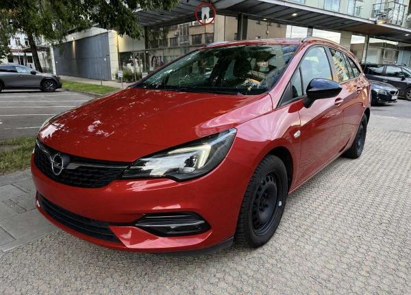 Red Opel Astra 2021 in Vilnius, with an engine capacity of 1.50 L and mileage of 192 thousand km for 5929 €, photo 1 on AUTOMOTO.COM.LV