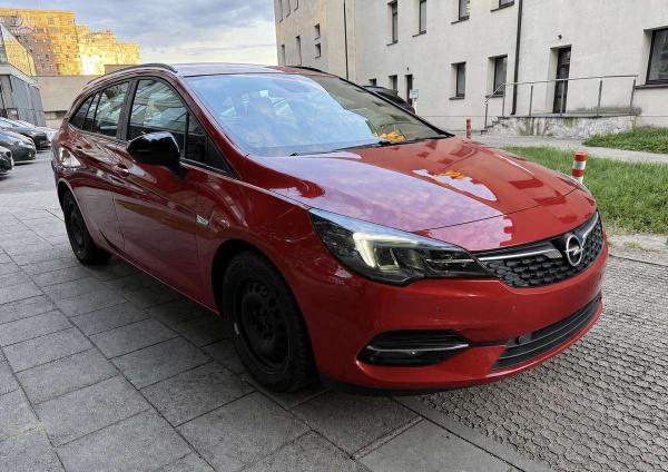 Red Opel Astra 2021 in Vilnius, with an engine capacity of 1.50 L and mileage of 192 thousand km for 5929 €, photo 4 on AUTOMOTO.COM.LV