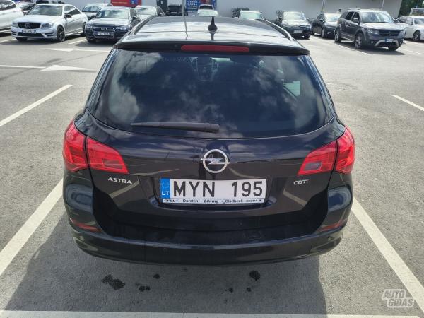Opel Astra 2011 in Kaunas, with an engine capacity of 1.70 L and mileage of 286 thousand km for 1500 €, photo 4 on AUTOMOTO.COM.LV