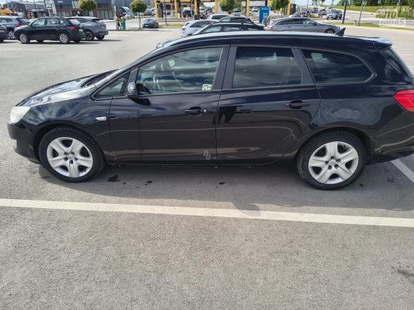 Opel Astra 2011 in Kaunas, with an engine capacity of 1.70 L and mileage of 286 thousand km for 1500 €, photo 8 on AUTOMOTO.COM.LV