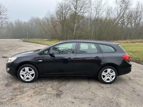 Opel Astra 2011 in Kaunas, with an engine capacity of 2.00 L and mileage of 193 thousand km for 3480 €, photo 8 on AUTOMOTO.COM.LV