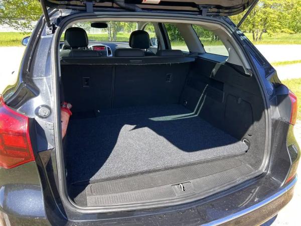 Opel Astra 2013 in Riga, with an engine capacity of 2.00 L and mileage of 344 thousand km for 3350 €, photo 7 on AUTOMOTO.COM.LV
