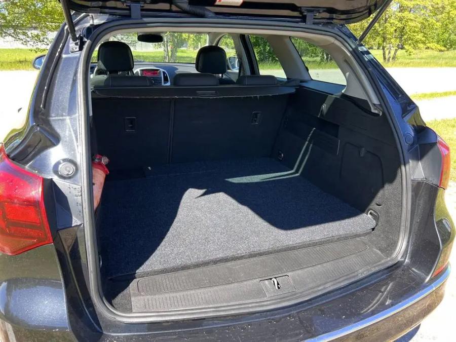 Opel Astra 2013 in Riga, with an engine capacity of 2.00 L and mileage of 344 thousand km for 3350 €, photo 8 on AUTOMOTO.COM.LV