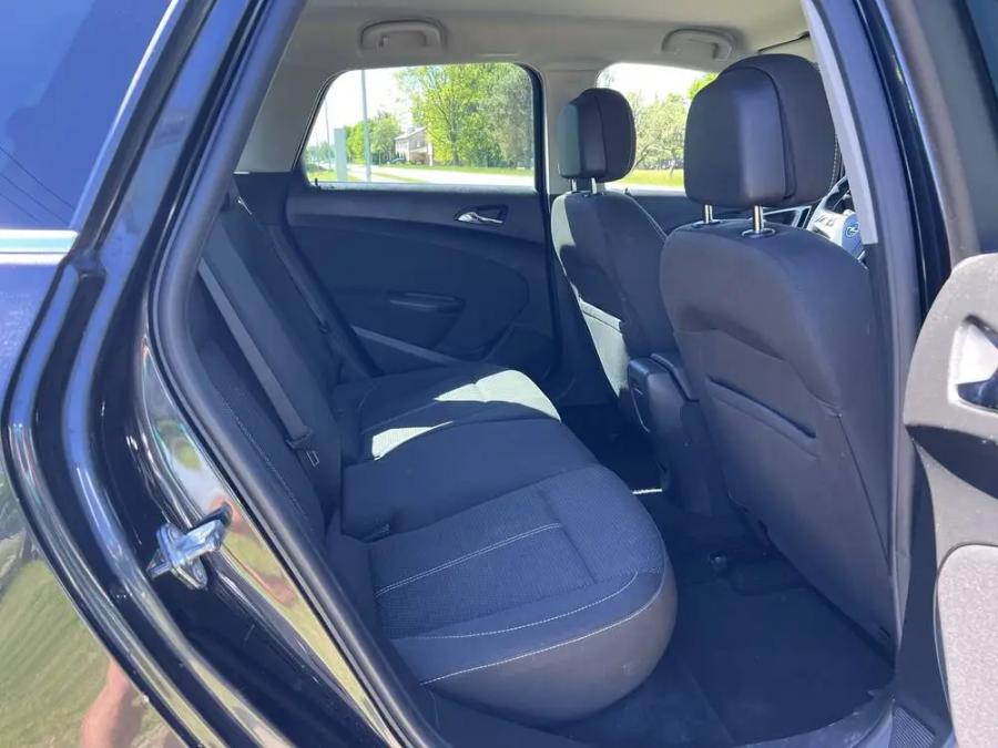 Opel Astra 2013 in Riga, with an engine capacity of 2.00 L and mileage of 344 thousand km for 3350 €, photo 12 on AUTOMOTO.COM.LV