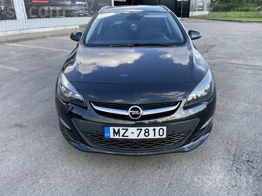 Black Opel Astra Van 2014 in Riga, with an engine capacity of 1.70 L and mileage of 260 thousand km for 4660 €, photo 1 on AUTOMOTO.COM.LV