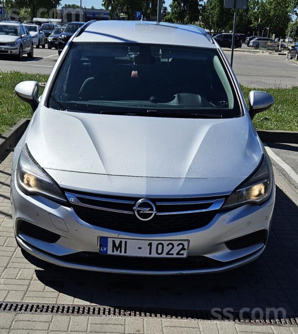 Grey Opel Astra Van 2016 in Riga, with an engine capacity of 1.60 L and mileage of 321 thousand km for 3800 €, photo 1 on AUTOMOTO.COM.LV