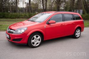 Red Opel Astra Van 2010 in Riga, with an engine capacity of 1.90 L and mileage of 271 thousand km for 3100 €, photo 3 on AUTOMOTO.COM.LV