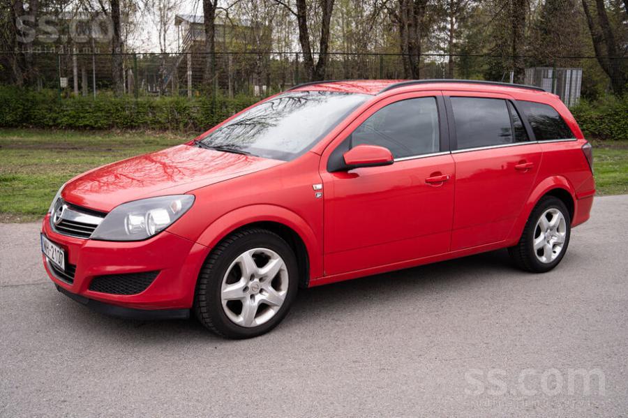 Red Opel Astra Van 2010 in Riga, with an engine capacity of 1.90 L and mileage of 271 thousand km for 3100 €, photo 3 on AUTOMOTO.COM.LV