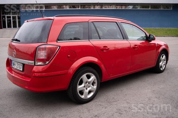 Sarkans Opel Astra Van 2010 Rīga, ar dzinēja tilpumu 1.90 L un nobraukumu 271 tūkst. km par 3100 €, foto 4 vietnē AUTOMOTO.COM.LV
