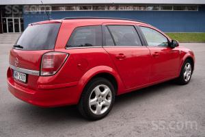 Red Opel Astra Van 2010 in Riga, with an engine capacity of 1.90 L and mileage of 271 thousand km for 3100 €, photo 5 on AUTOMOTO.COM.LV