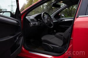 Red Opel Astra Van 2010 in Riga, with an engine capacity of 1.90 L and mileage of 271 thousand km for 3100 €, photo 10 on AUTOMOTO.COM.LV