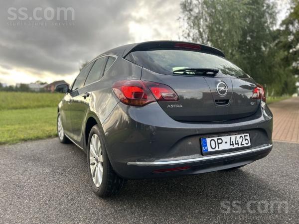 Violet Opel Astra 2015 in Saldus, with an engine capacity of 1.60 L and mileage of 146 thousand km for 5850 €, photo 5 on AUTOMOTO.COM.LV