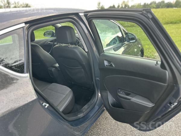 Violet Opel Astra 2015 in Saldus, with an engine capacity of 1.60 L and mileage of 146 thousand km for 5850 €, photo 9 on AUTOMOTO.COM.LV
