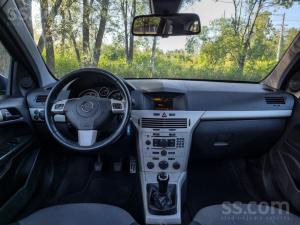 Violets Opel Astra 2008 Rīga, ar dzinēja tilpumu 1.90 L un nobraukumu 270 tūkst. km par 1100 €, foto 8 vietnē AUTOMOTO.COM.LV