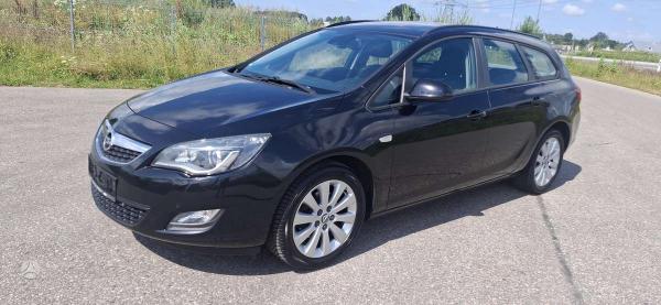 Violet Opel Astra 2011 in Marijampole, with an engine capacity of 1.96 L and mileage of 289 thousand km for 3300 €, photo 1 on AUTOMOTO.COM.LV