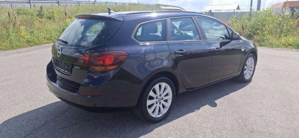 Violet Opel Astra 2011 in Marijampole, with an engine capacity of 1.96 L and mileage of 289 thousand km for 3300 €, photo 3 on AUTOMOTO.COM.LV