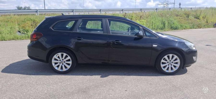 Violets Opel Astra 2011 Marijampole, ar dzinēja tilpumu 1.96 L un nobraukumu 289 tūkst. km par 3300 €, foto 7 vietnē AUTOMOTO.COM.LV