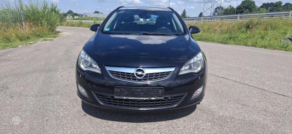 Violet Opel Astra 2011 in Marijampole, with an engine capacity of 1.96 L and mileage of 289 thousand km for 3300 €, photo 7 on AUTOMOTO.COM.LV
