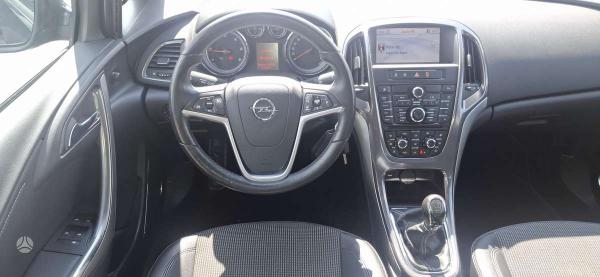 Violet Opel Astra 2011 in Marijampole, with an engine capacity of 1.96 L and mileage of 289 thousand km for 3300 €, photo 10 on AUTOMOTO.COM.LV