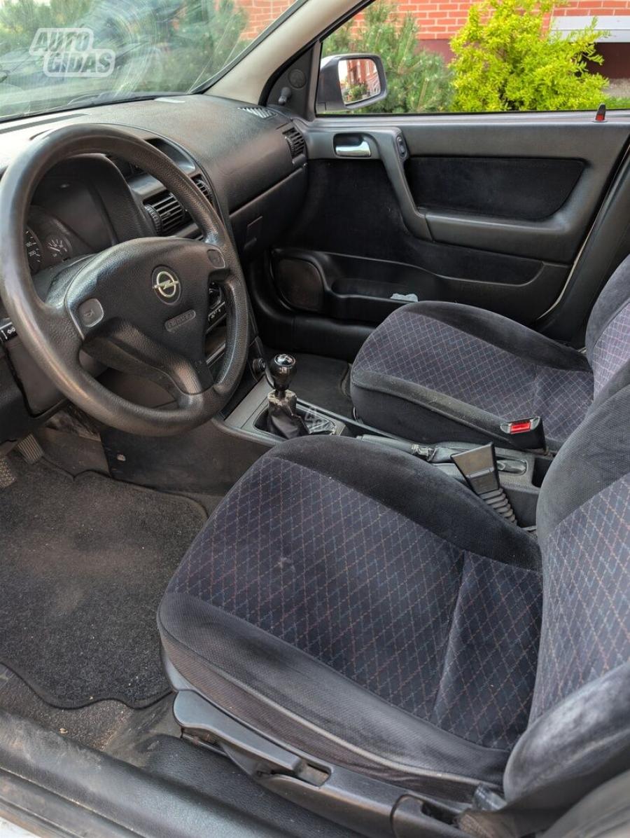 White Opel Astra 1998 in Klaipeda, with an engine capacity of 1.60 L and mileage of 236 thousand km for 850 €, photo 8 on AUTOMOTO.COM.LV